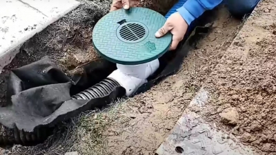 How to Bury Downspouts: Complete DIY Guide from the Pros